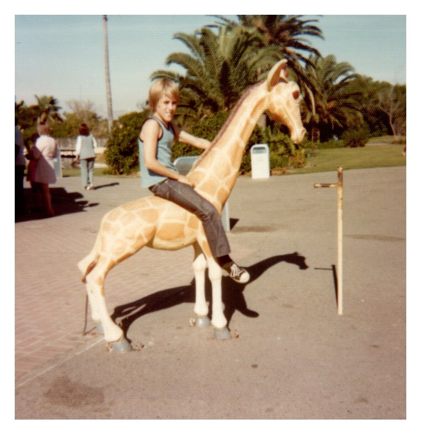 1970s American Boy Riding Giraffe Vintage Photo – techrewinds