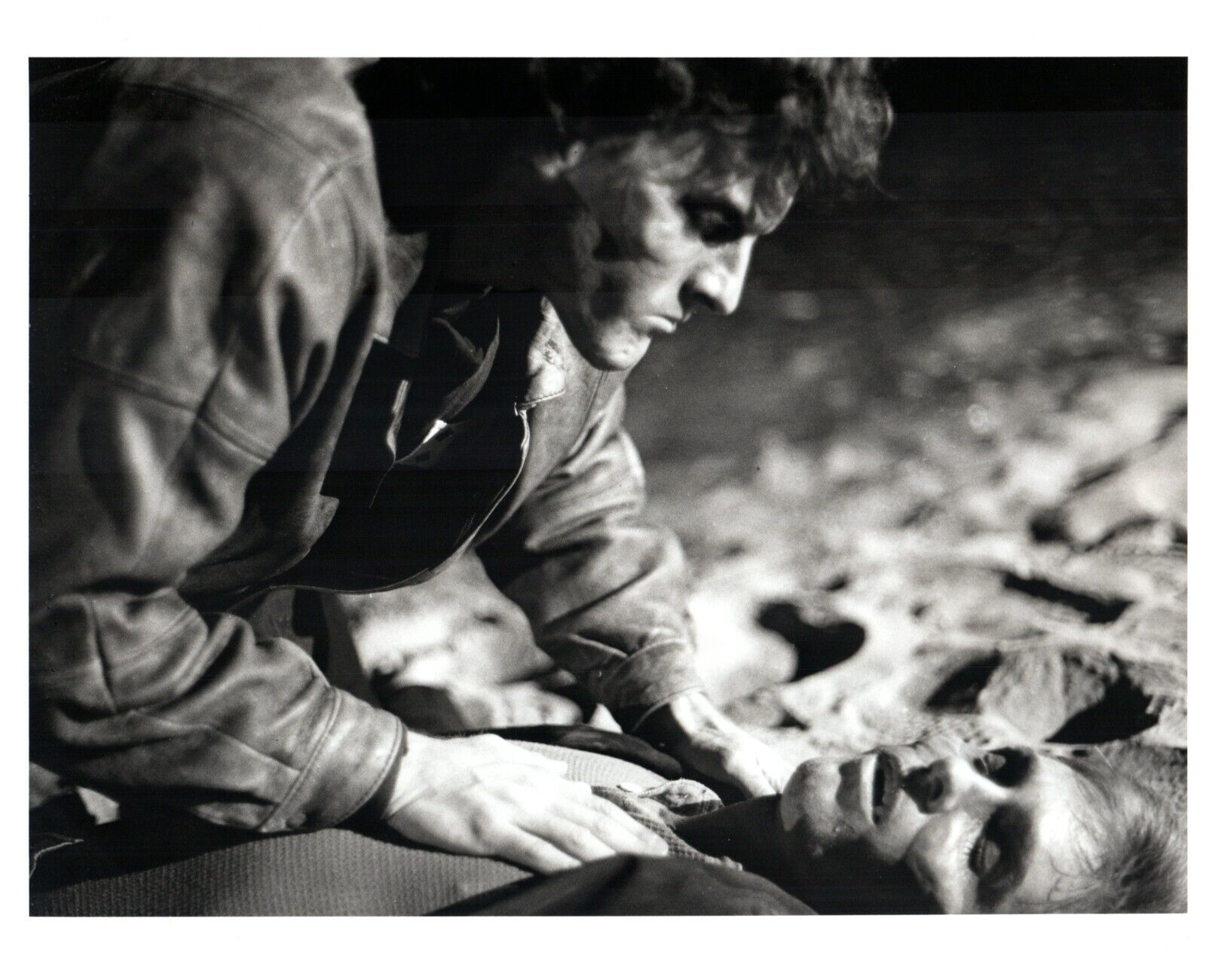 1980s Dramatic Movie Scene Man Checking Unconscious Woman Vintage Phot ...