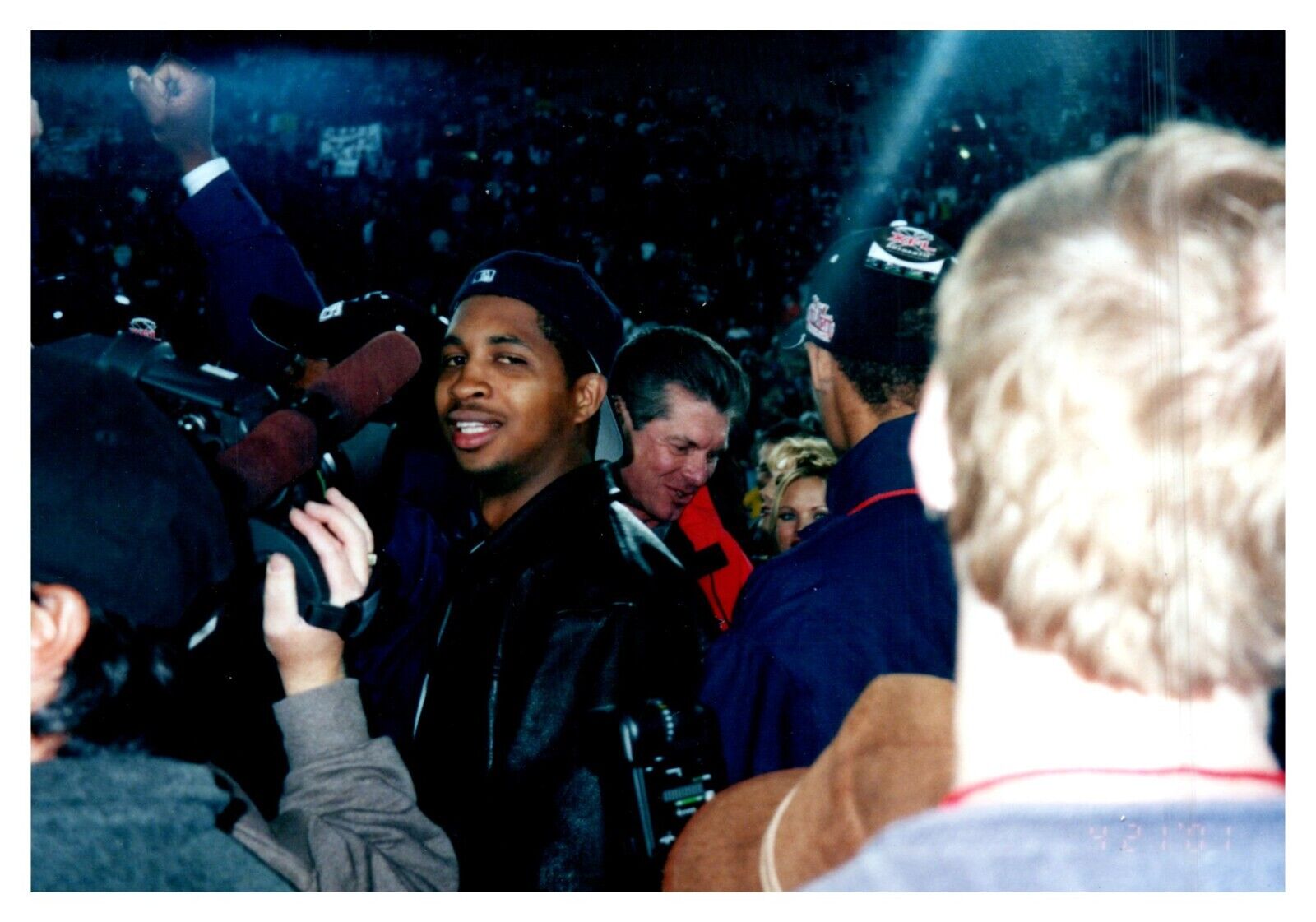 2000s Football Celebration Scene with Cameraman and Crowd vintage phot ...